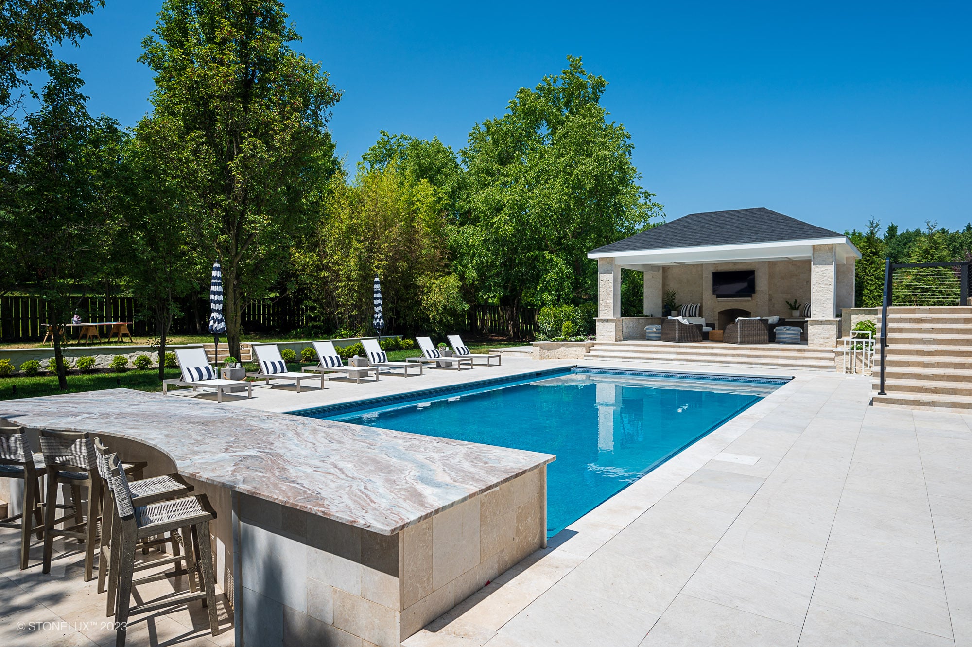 White Harmony Pool Retreat: Pera Cream Marble & Porcelain in Ashburn, VA
